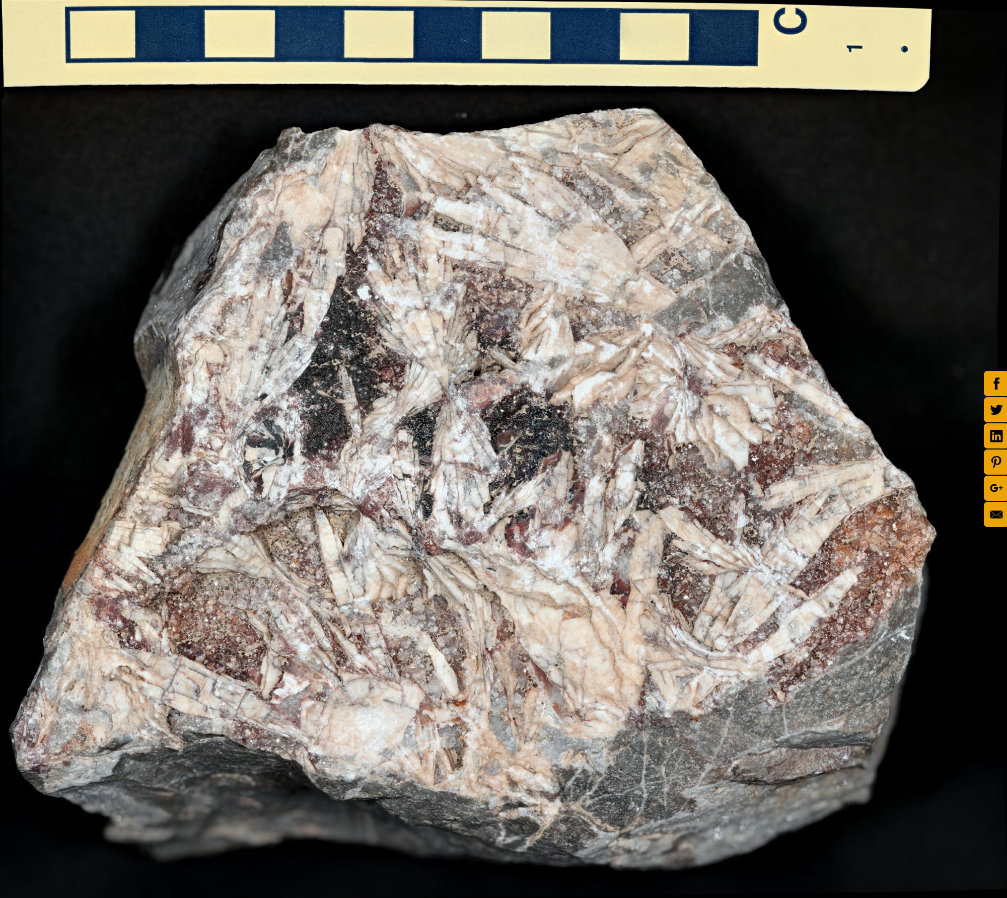 Barite with quartz and hematite on quartzite