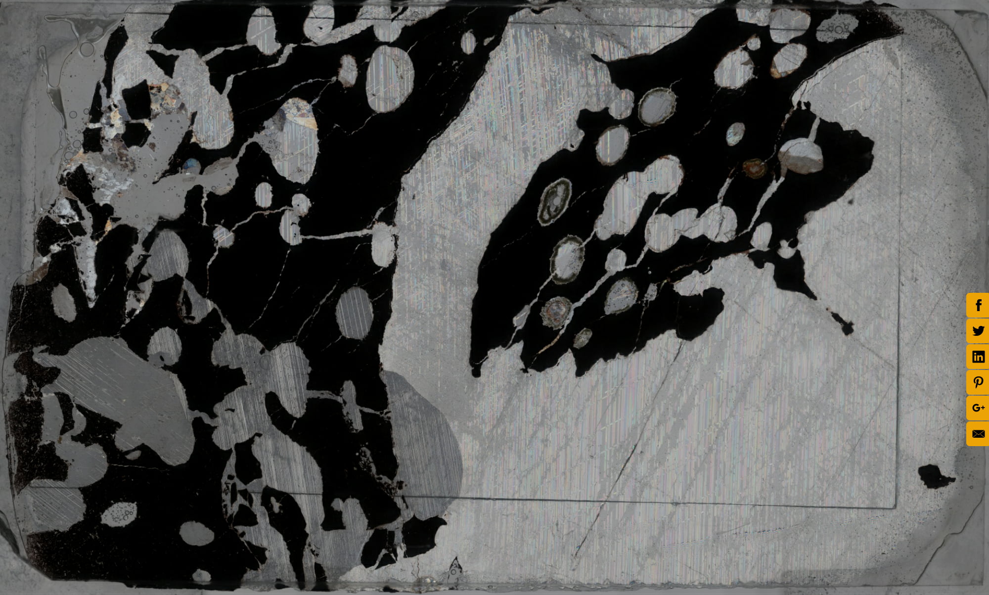 Calcite in Precambrian-Aged Amygdaloidal Basalt, Crossed Polars